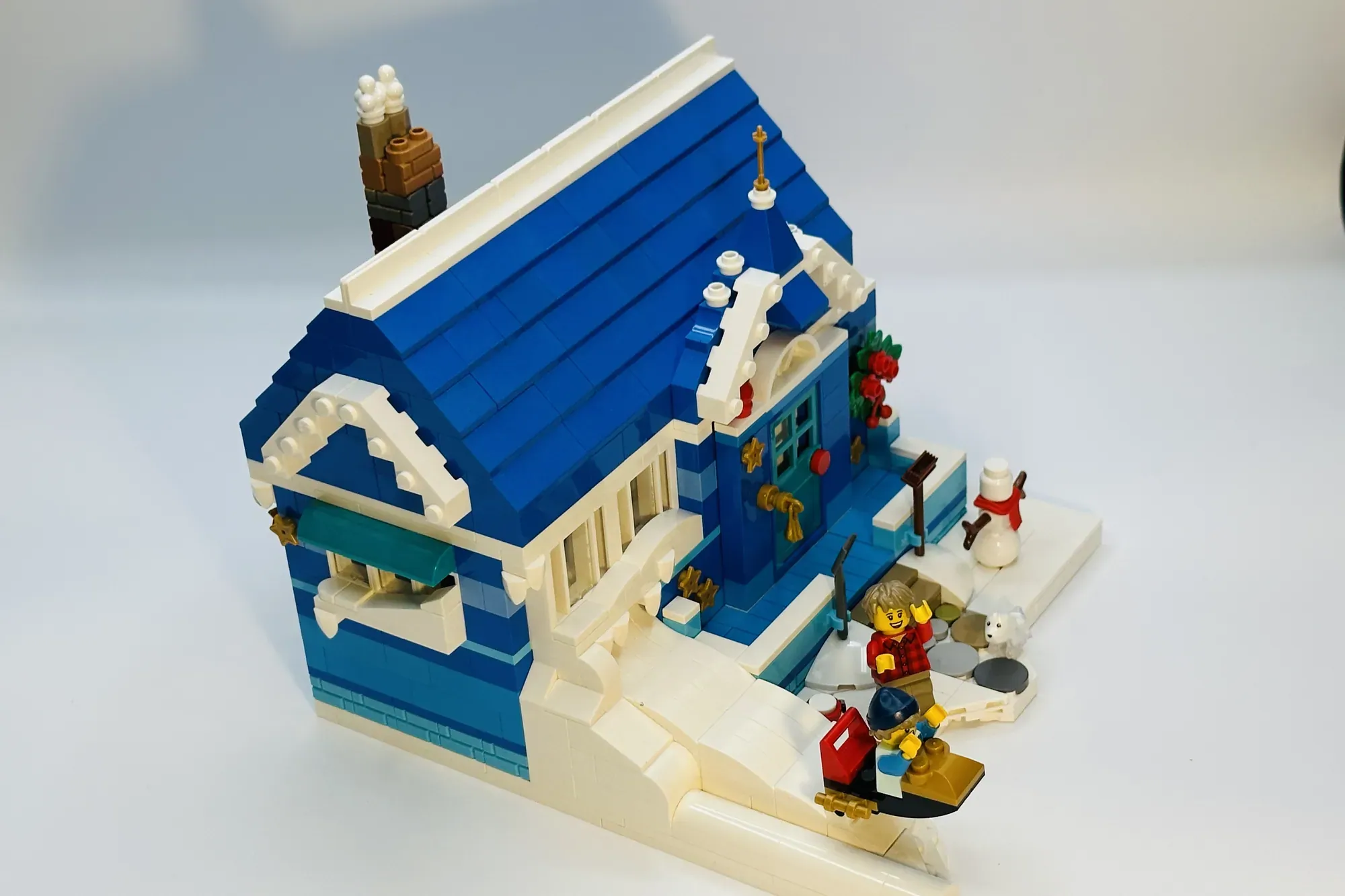 Sledding at the Charming Blue Cottage | LEGO® Ideas